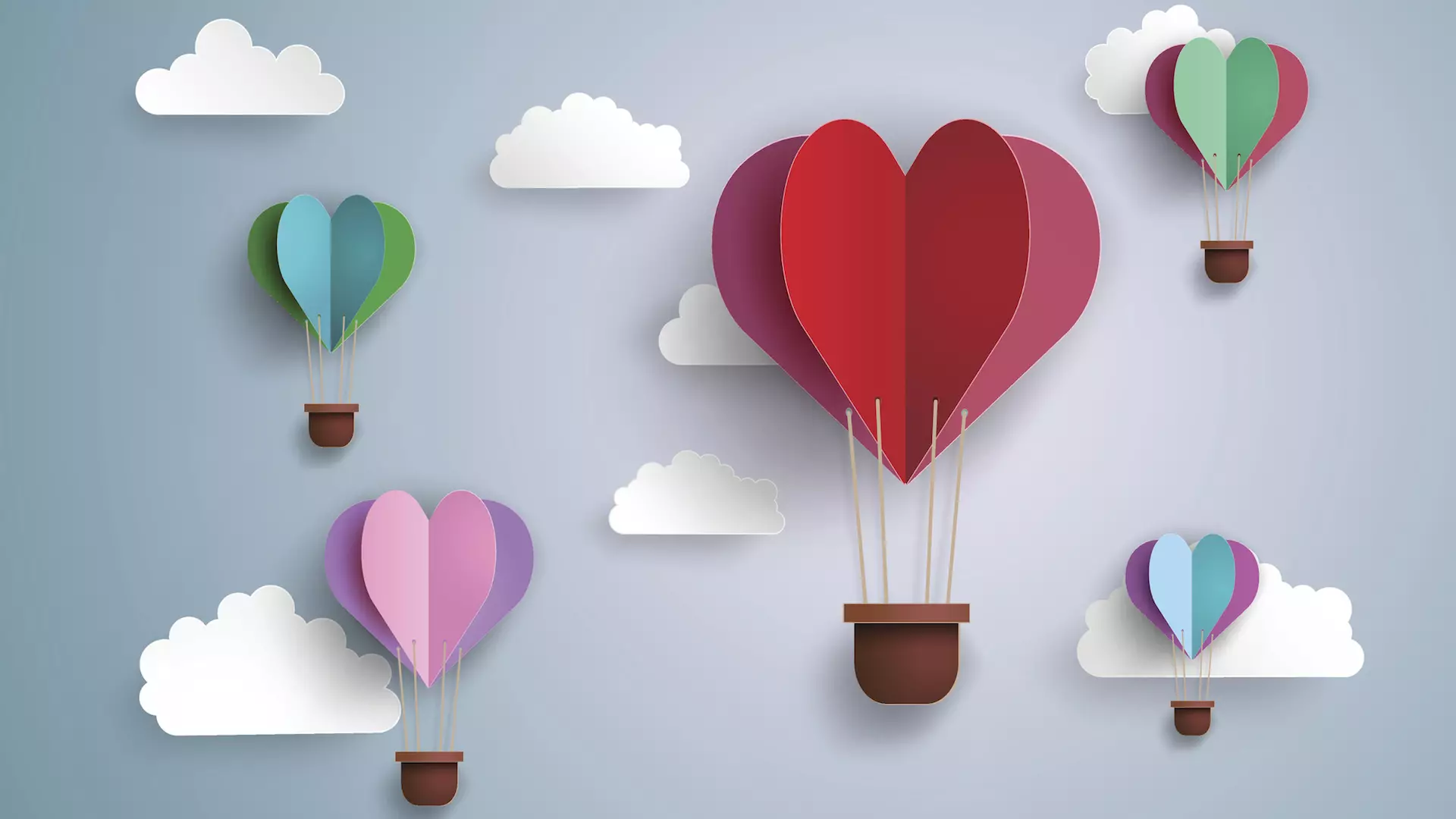 Širdies formos karšto oro balionai, pagaminti iš popieriaus, iliustruojantys santuokos ir ADHD statistiką