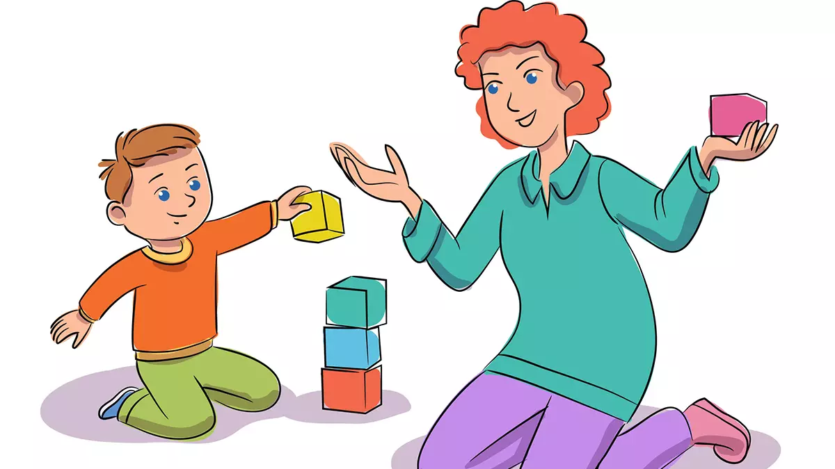 Момче со АДХД игра блок со мајка си за да се фокусира